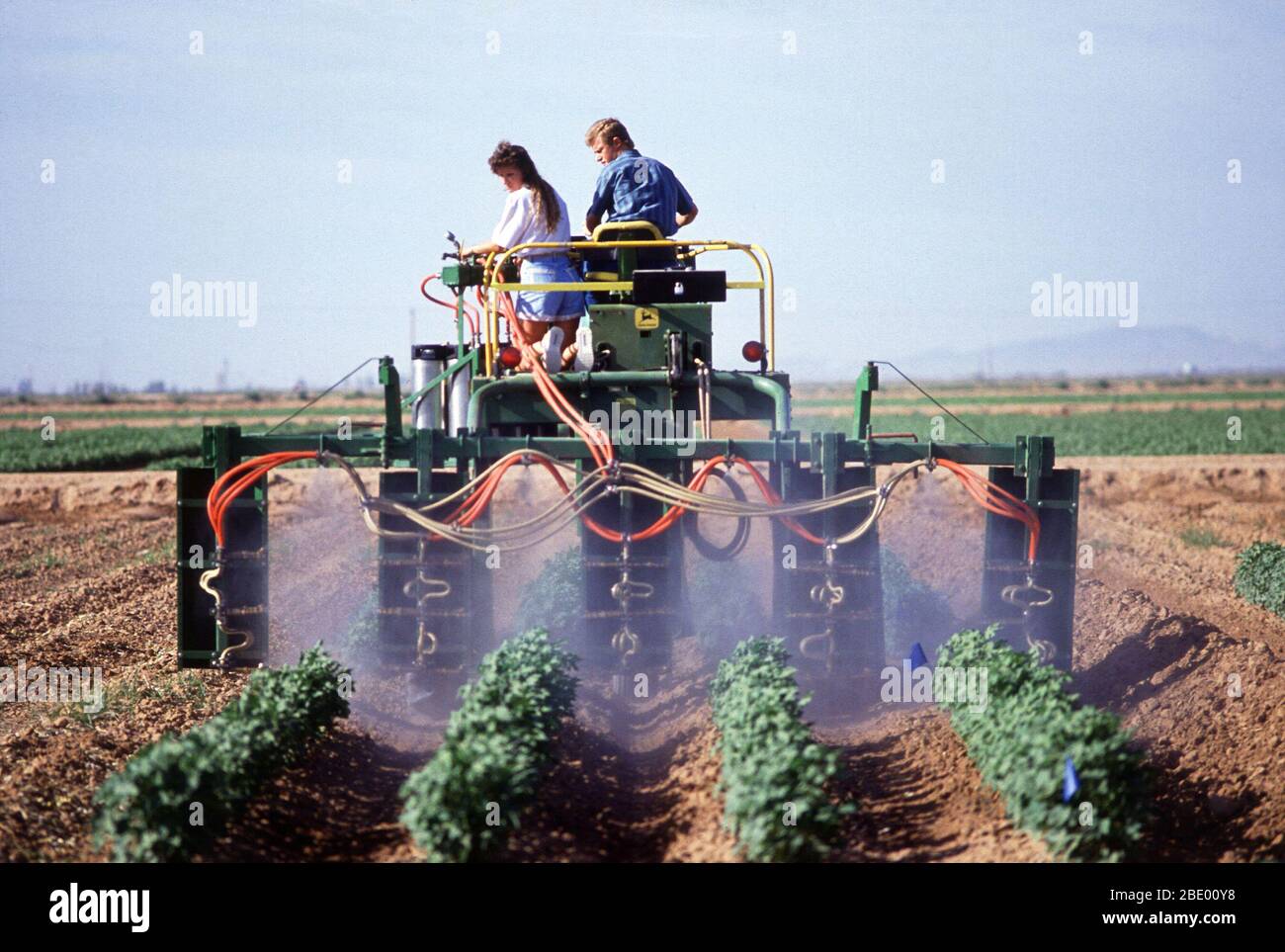 Spraying fields for pests Stock Photo - Alamy