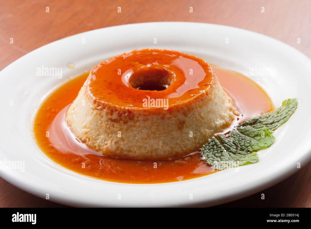 Brazilian Milk Pudding with sugar syrup Stock Photo - Alamy