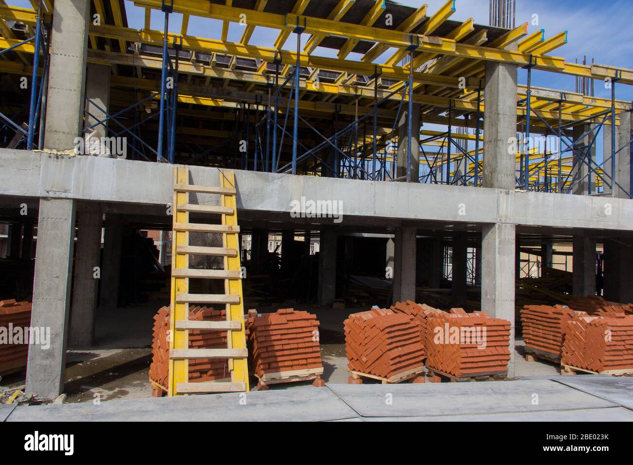 Makeshift staircase to the last floor of the building. Construction ...