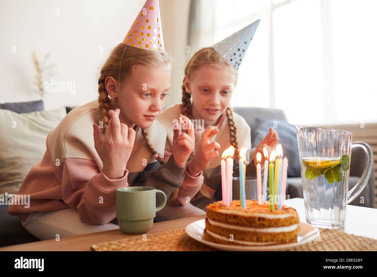 Two boys with party hat hi-res stock photography and images - Alamy