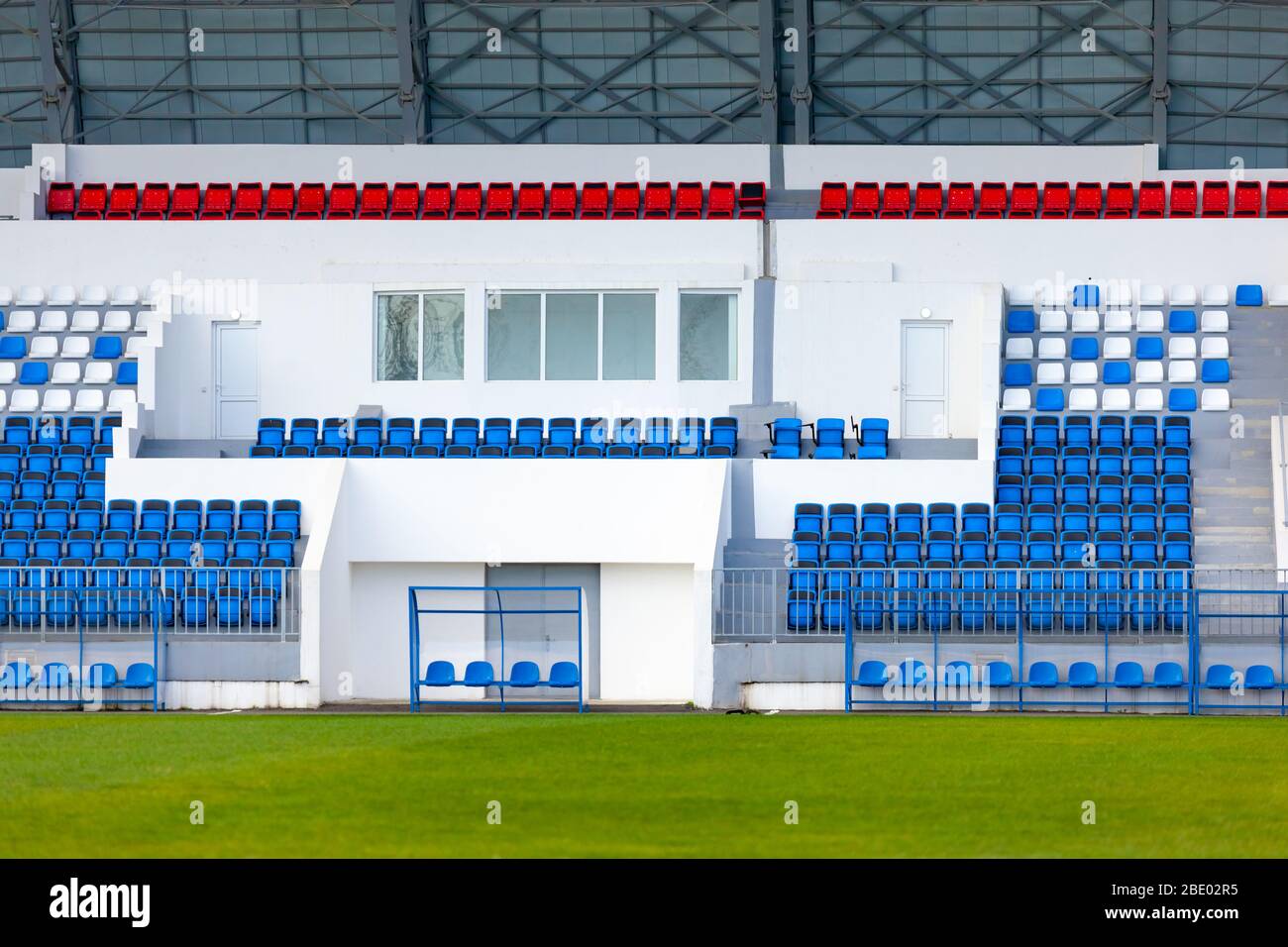 blue and white rows of seats on the stadium Stock Photo - Alamy