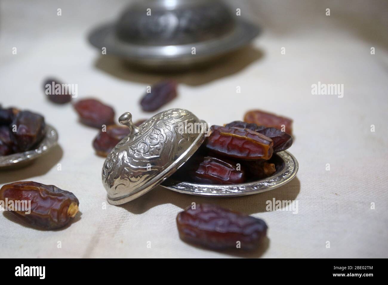 image of date palm presentation in copper containers Stock Photo - Alamy