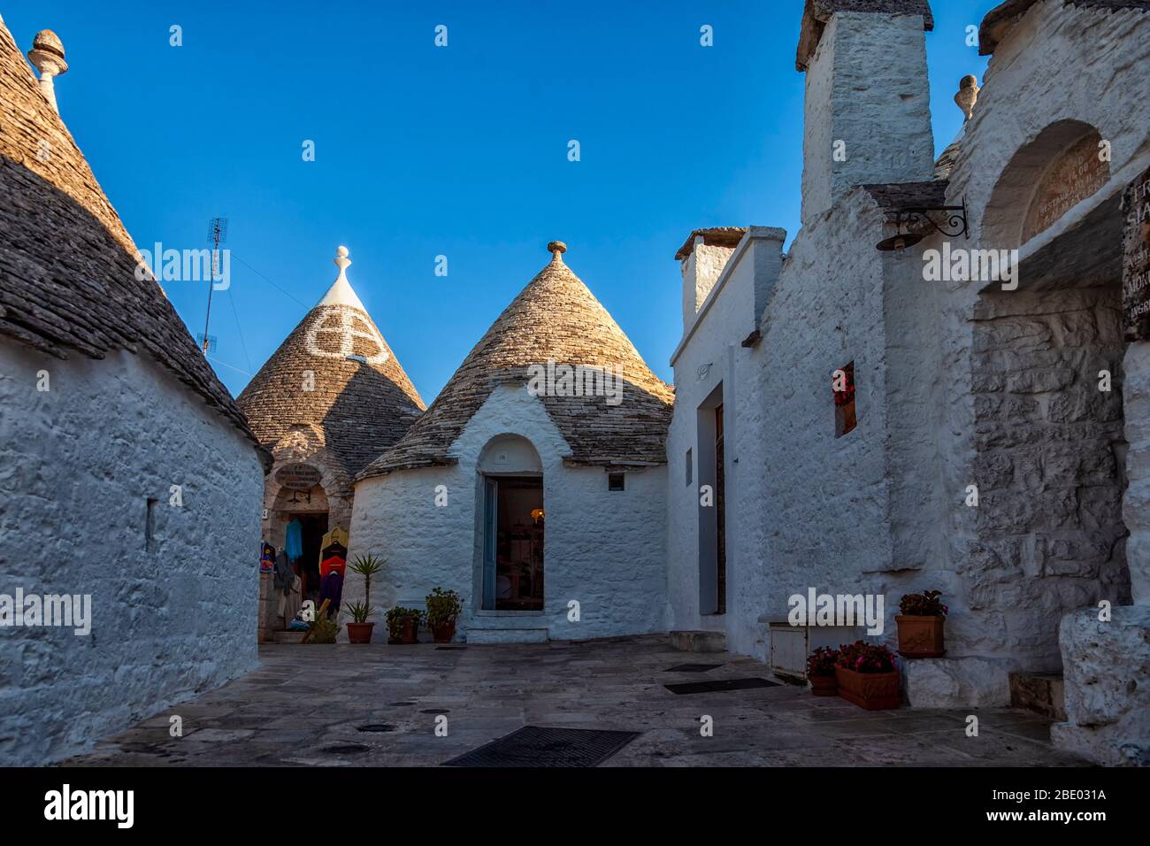 Typical trulli buildings with conical roofs in Alberobello, Apulia ...