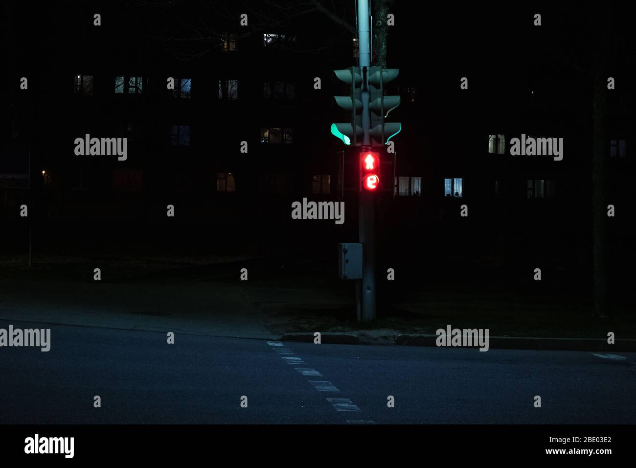 Red light at the intersection at night Stock Photo - Alamy