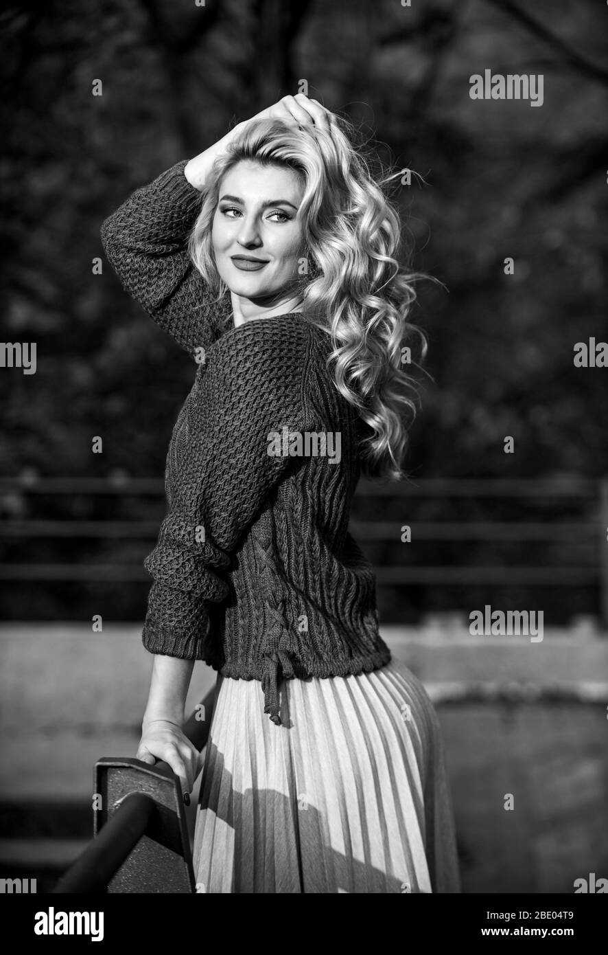 Woman in knitted sweater Black and White Stock Photos & Images - Alamy