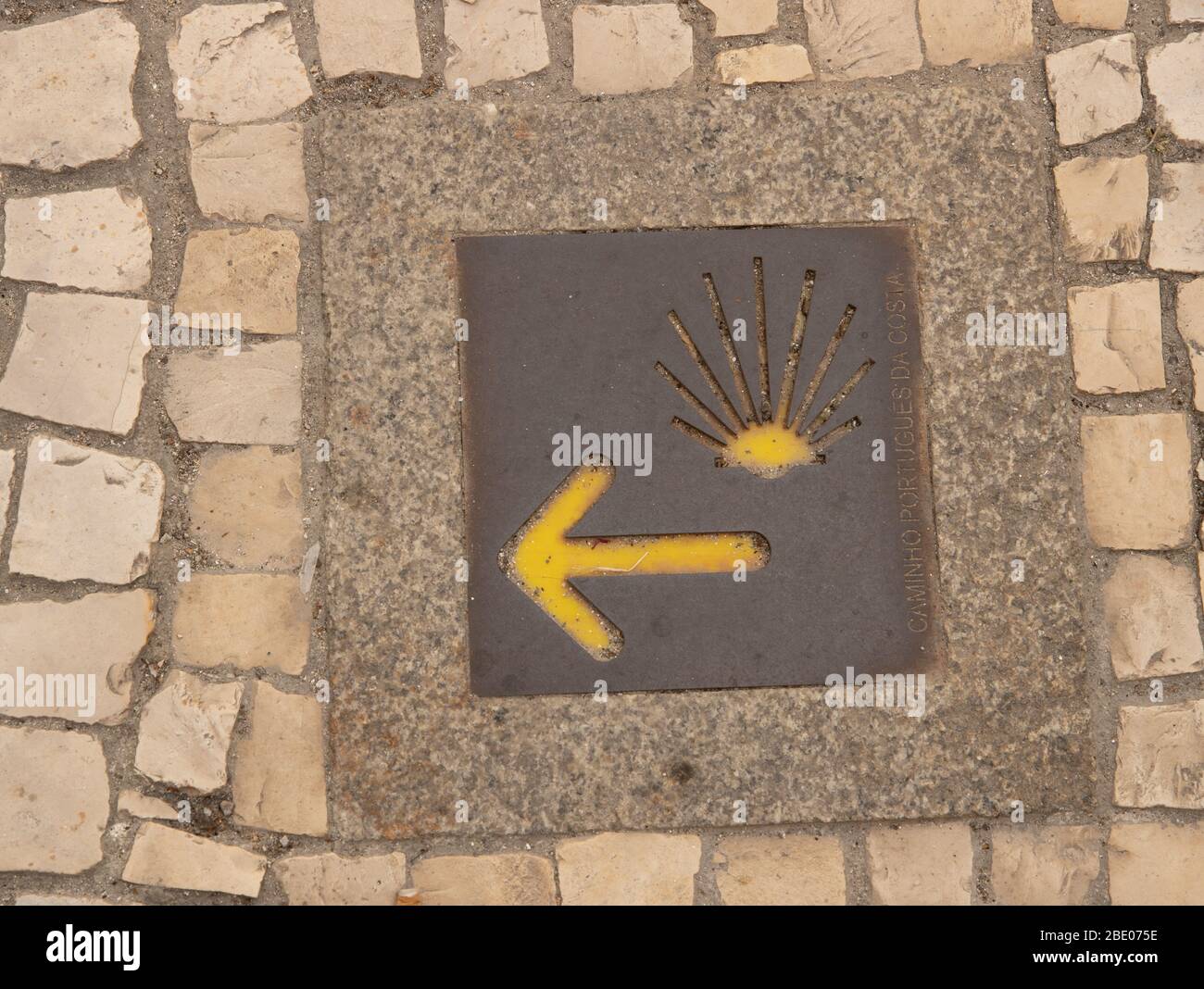 Camino de Santiago sign and yellow arrow. Camino shell symbol sign ...
