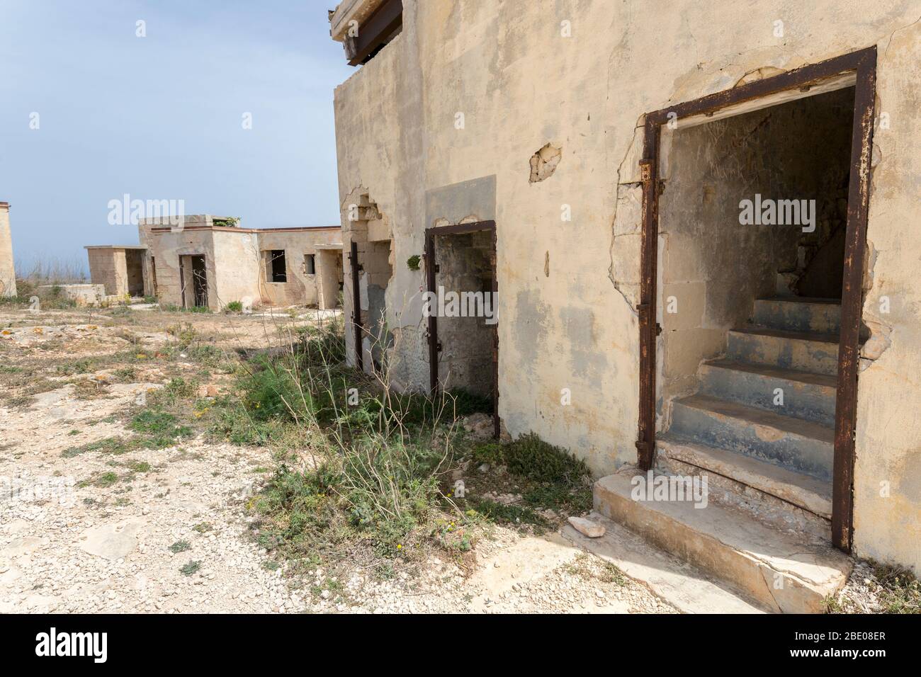 Ruined buildings, possibly dating from the second world war, at the end ...