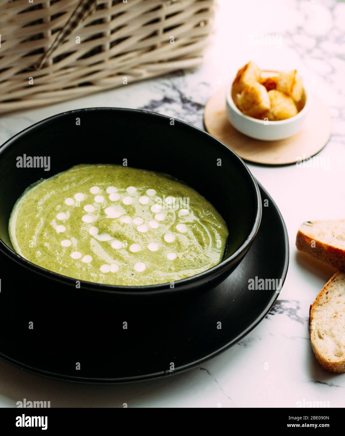 green mash with side crackers and bread Stock Photo - Alamy