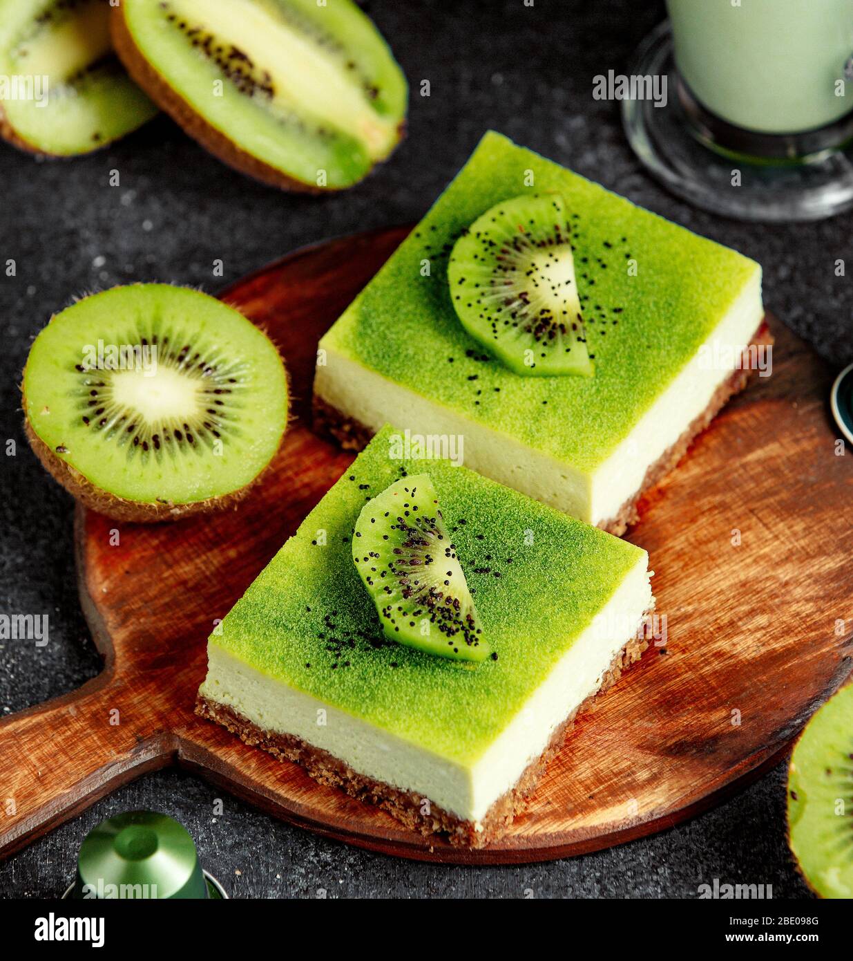 kiwi dessert with side sliced kiwi Stock Photo - Alamy