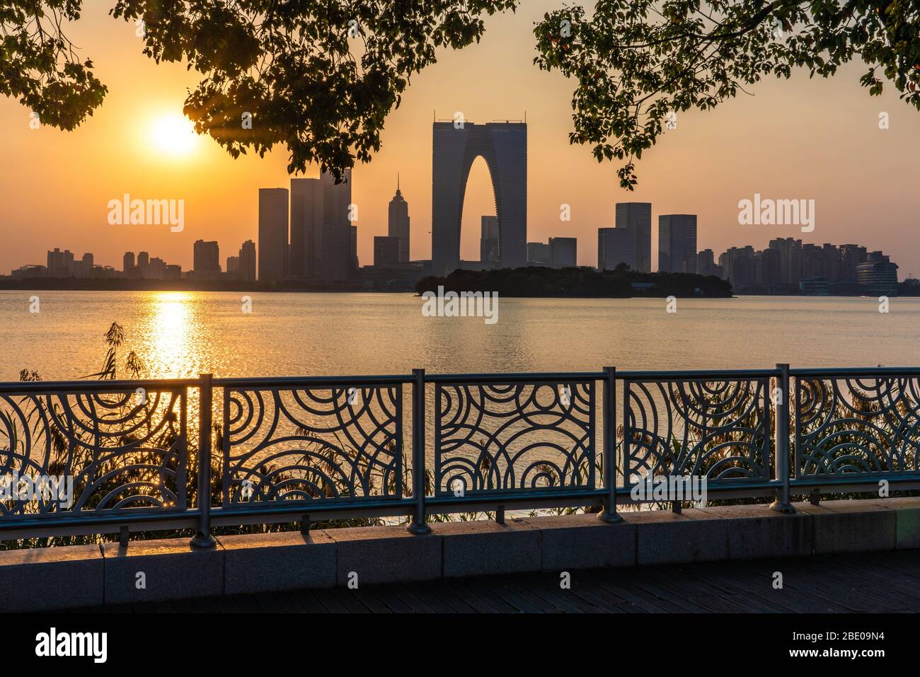SUZHOU, CHINA- NOVEMBER 05: View of Jinji Lake scenery with the city ...