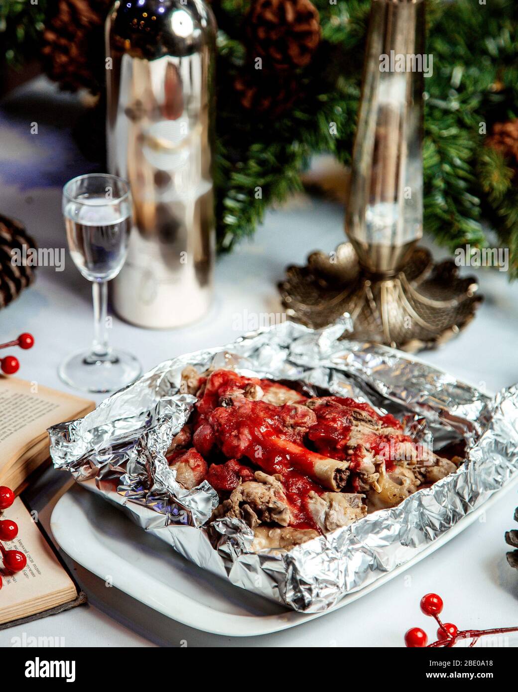 meat pieces with sauce and glass of vodka Stock Photo - Alamy