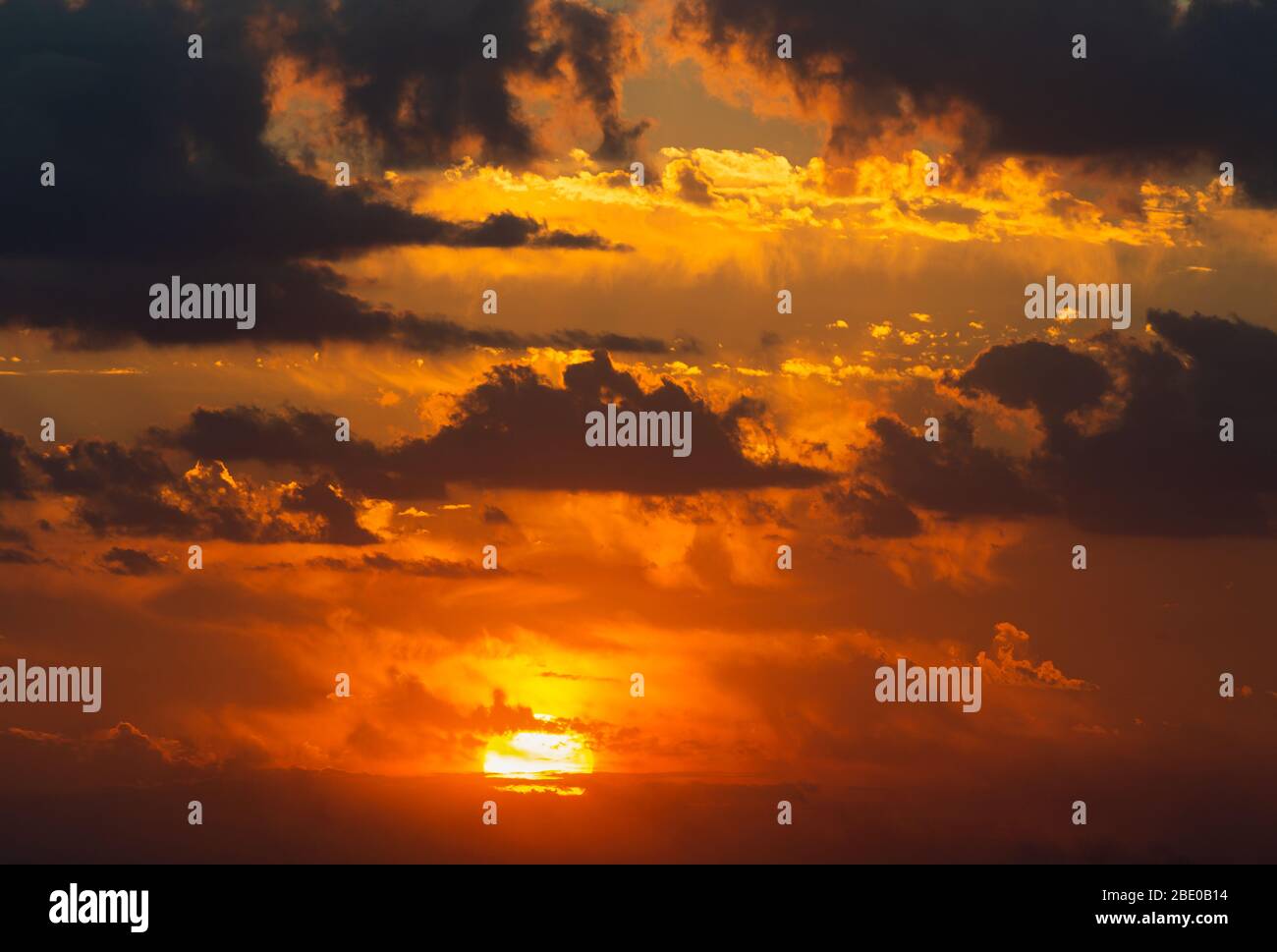 Multiple layers of clouds during sunset time. Dramatic cloudscape with ...