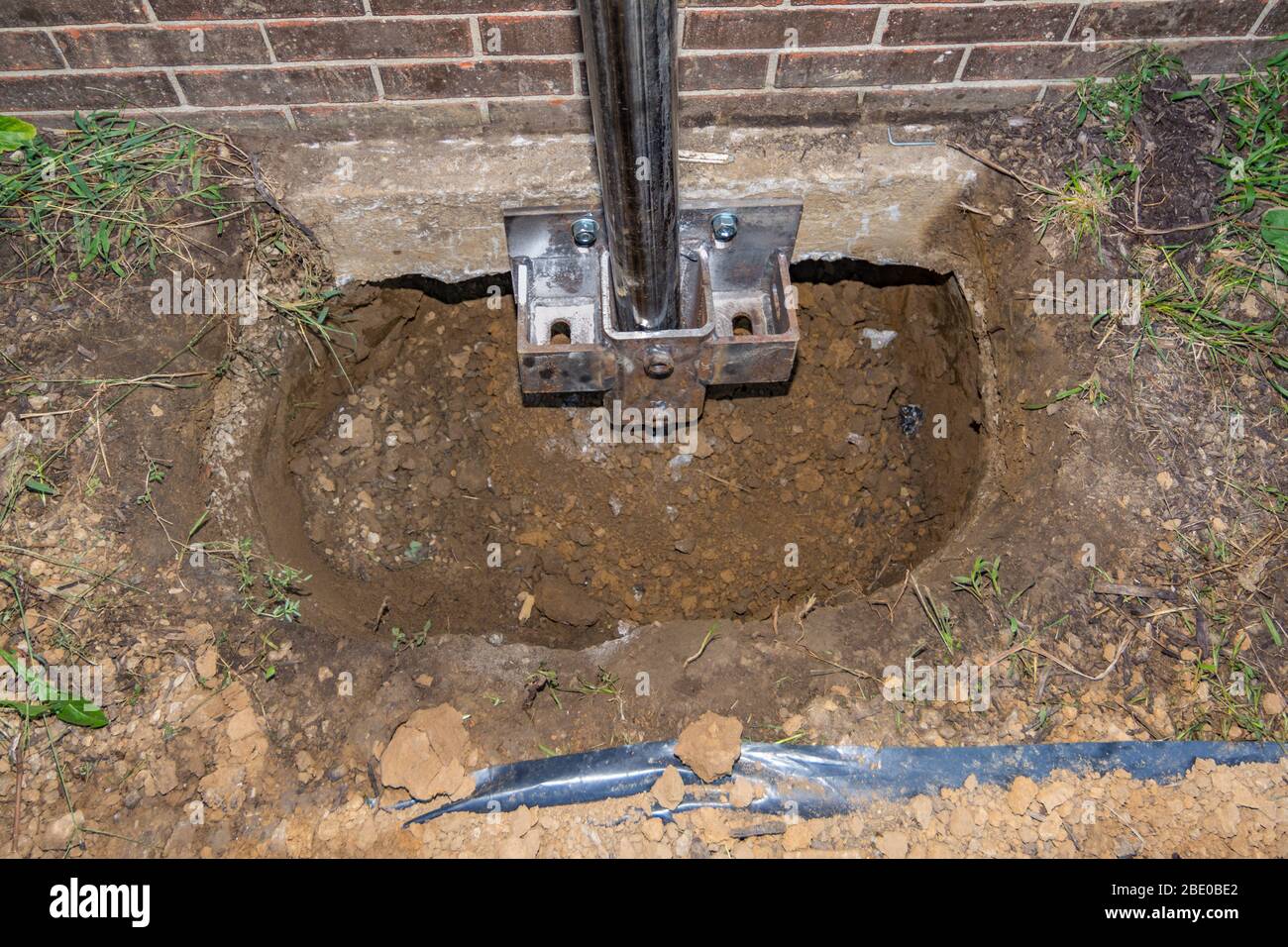 Repairs for a house that has settled and cracked foundation Stock Photo ...