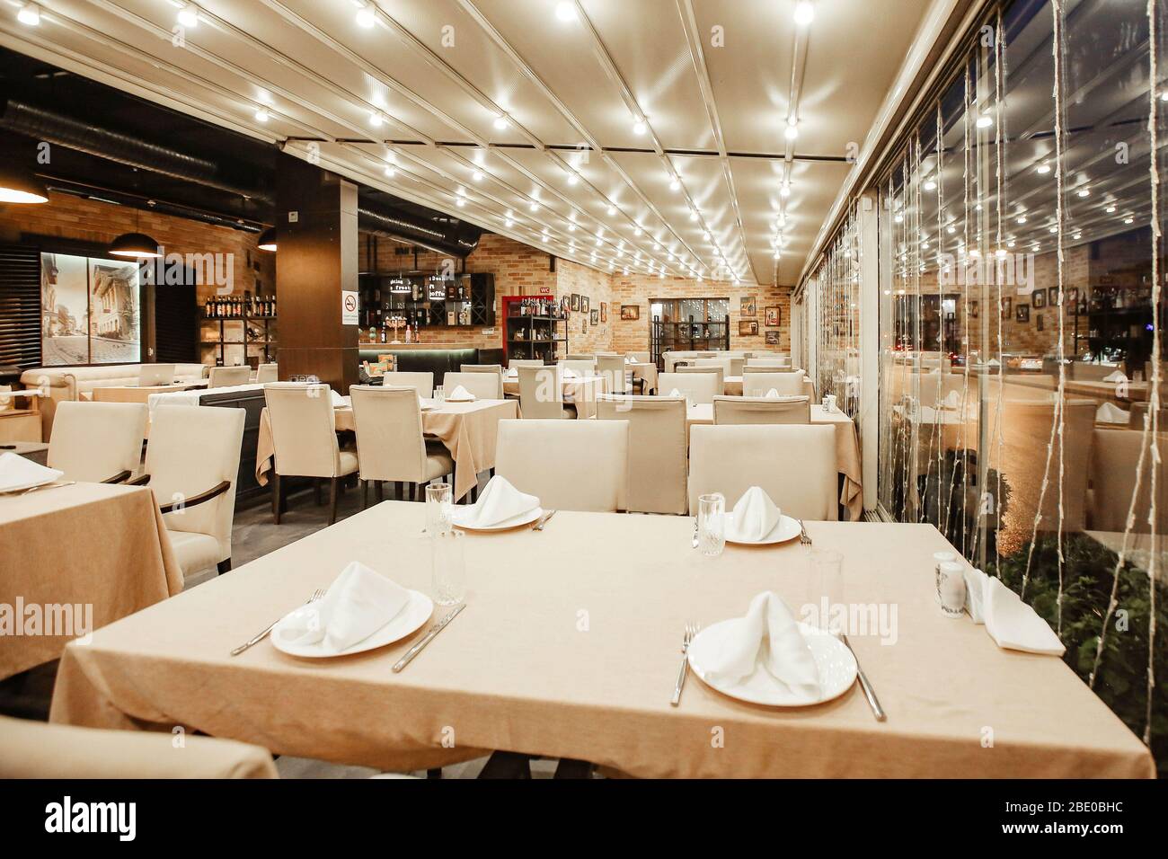restaurant hall with lots of table Stock Photo - Alamy