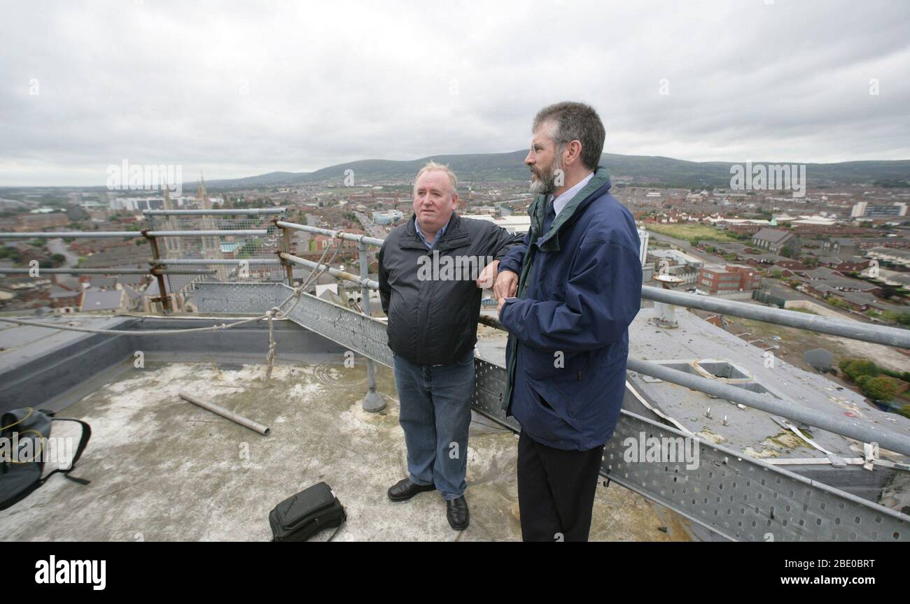 Files: former Sinn Fein President Gerry Adams (R), and party member Fra ...