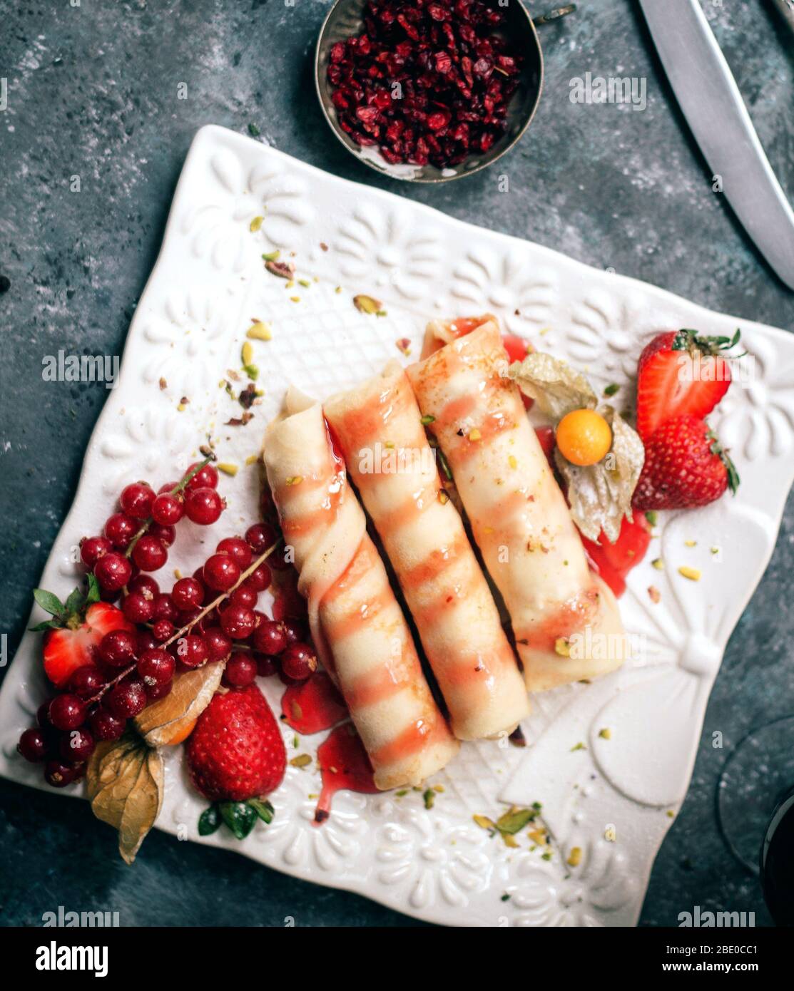 sliced ham with berries and fruits Stock Photo - Alamy