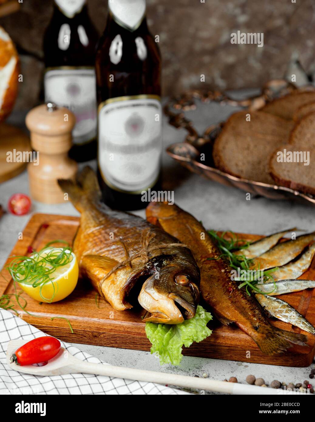 smoked fish and bottles of beer Stock Photo - Alamy