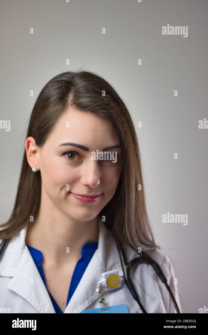 Healthcare professional head shot up close isolated on grey background ...