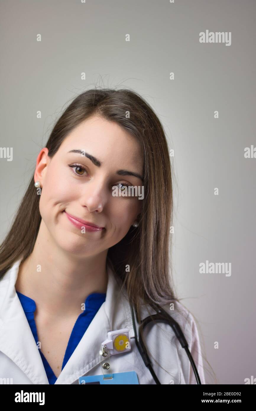Healthcare professional head shot up close isolated on grey background ...
