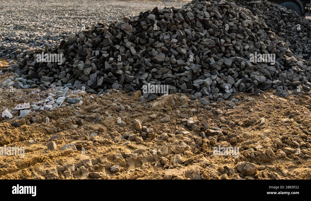 Gravel and sand piles on construction site. Materials for building ...
