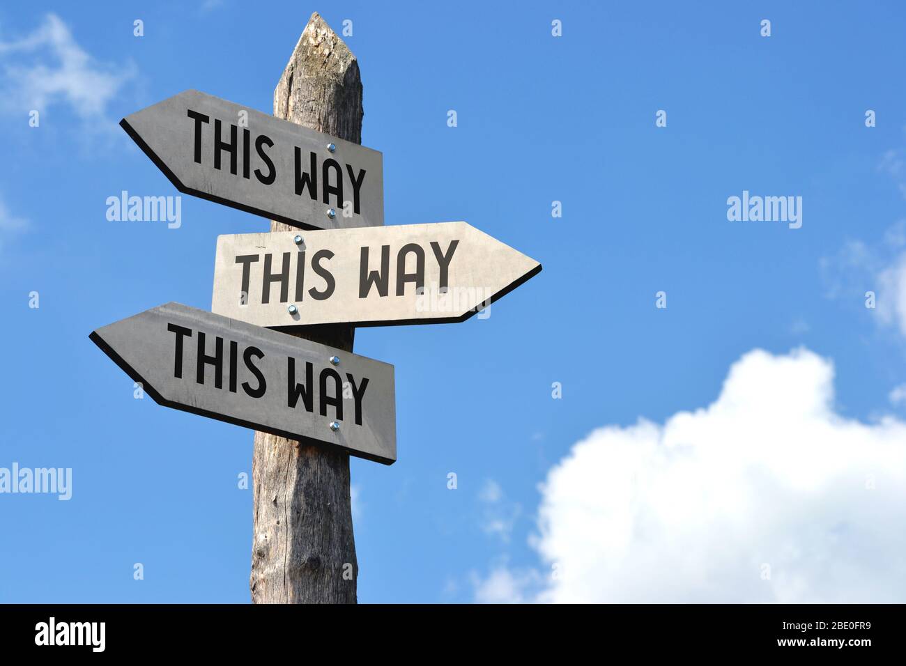 This way signpost Stock Photo - Alamy