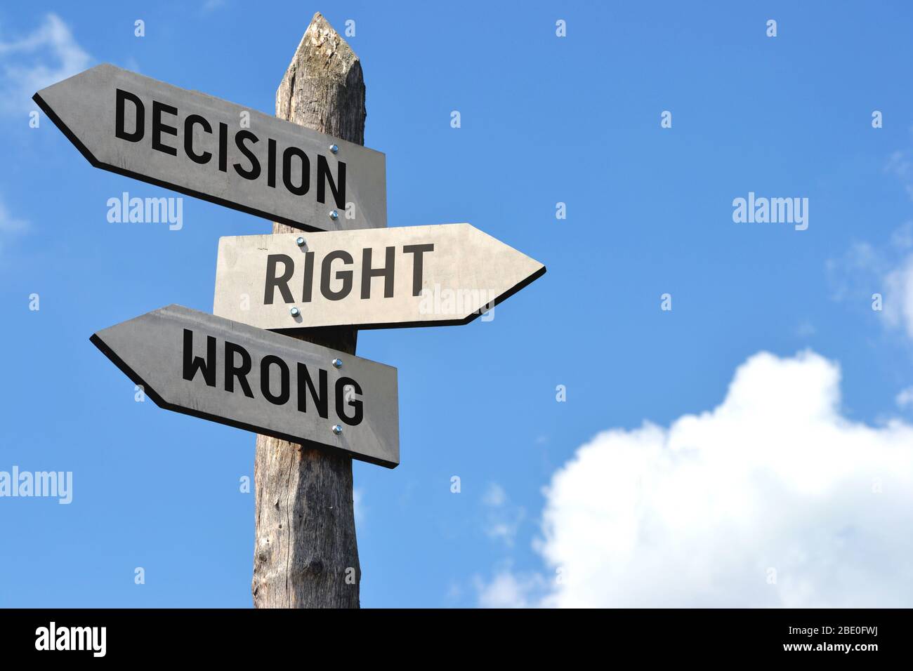 Decision, right, wrong signpost Stock Photo - Alamy