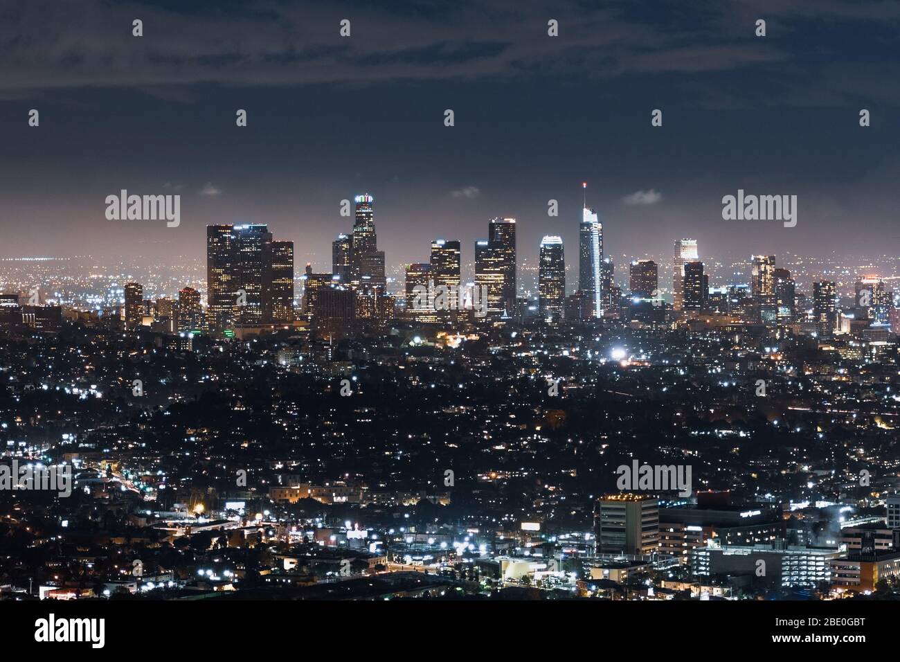 Aerial night view of financial district skyline in downtown Los Angeles ...