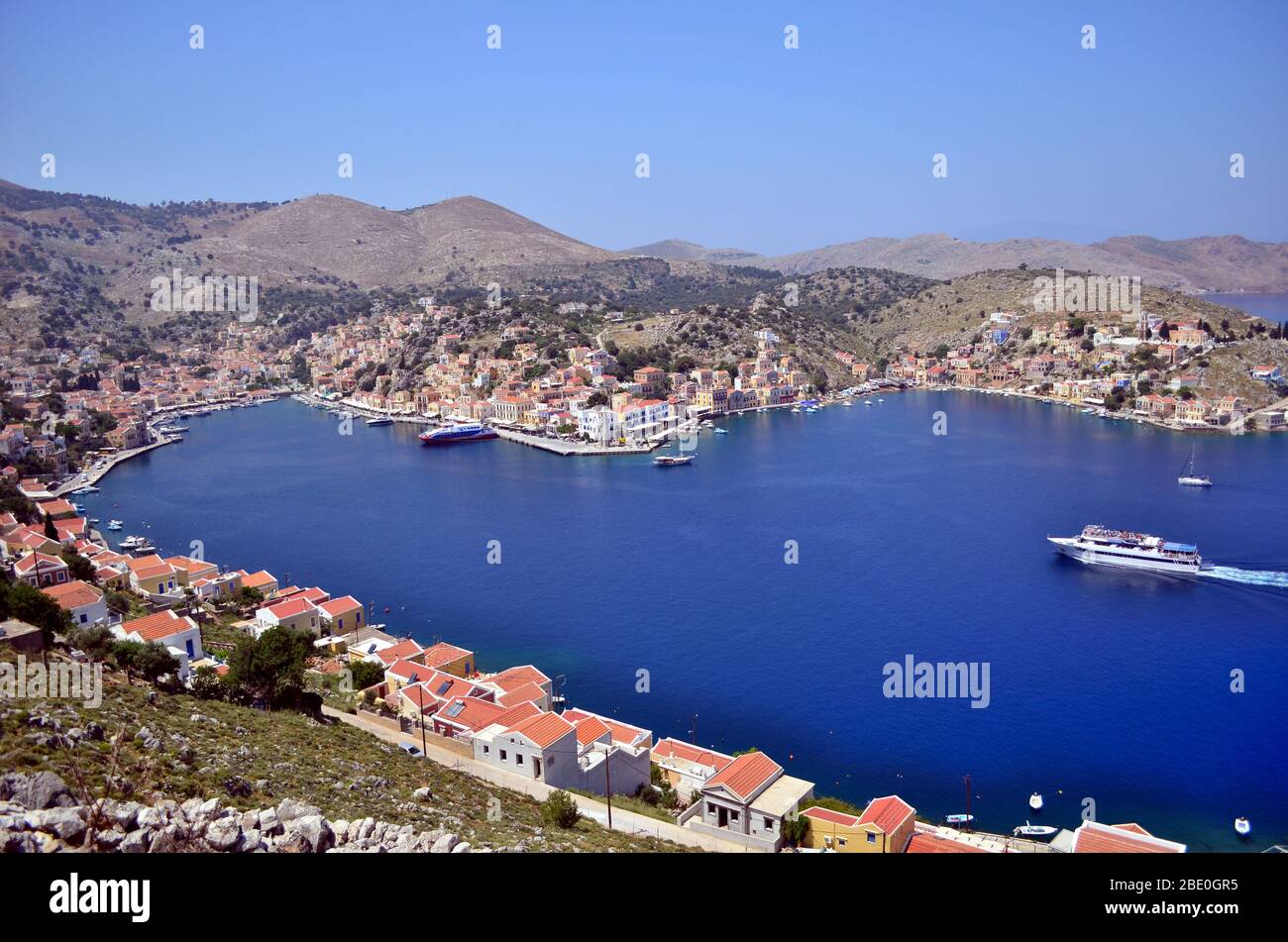 So deep blue laguna on Symi island Stock Photo - Alamy