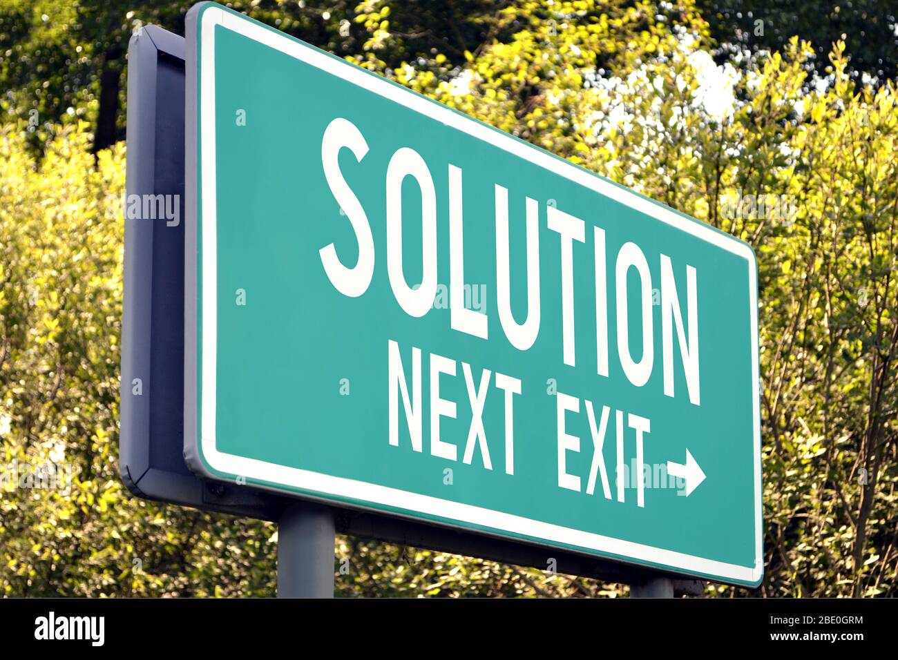 Solution - next exit sign Stock Photo - Alamy