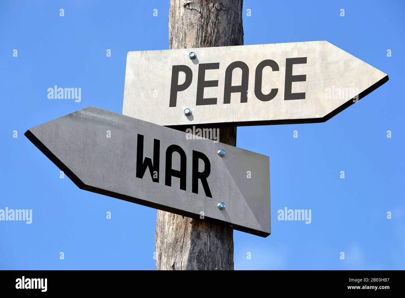 Peace and war signpost Stock Photo - Alamy