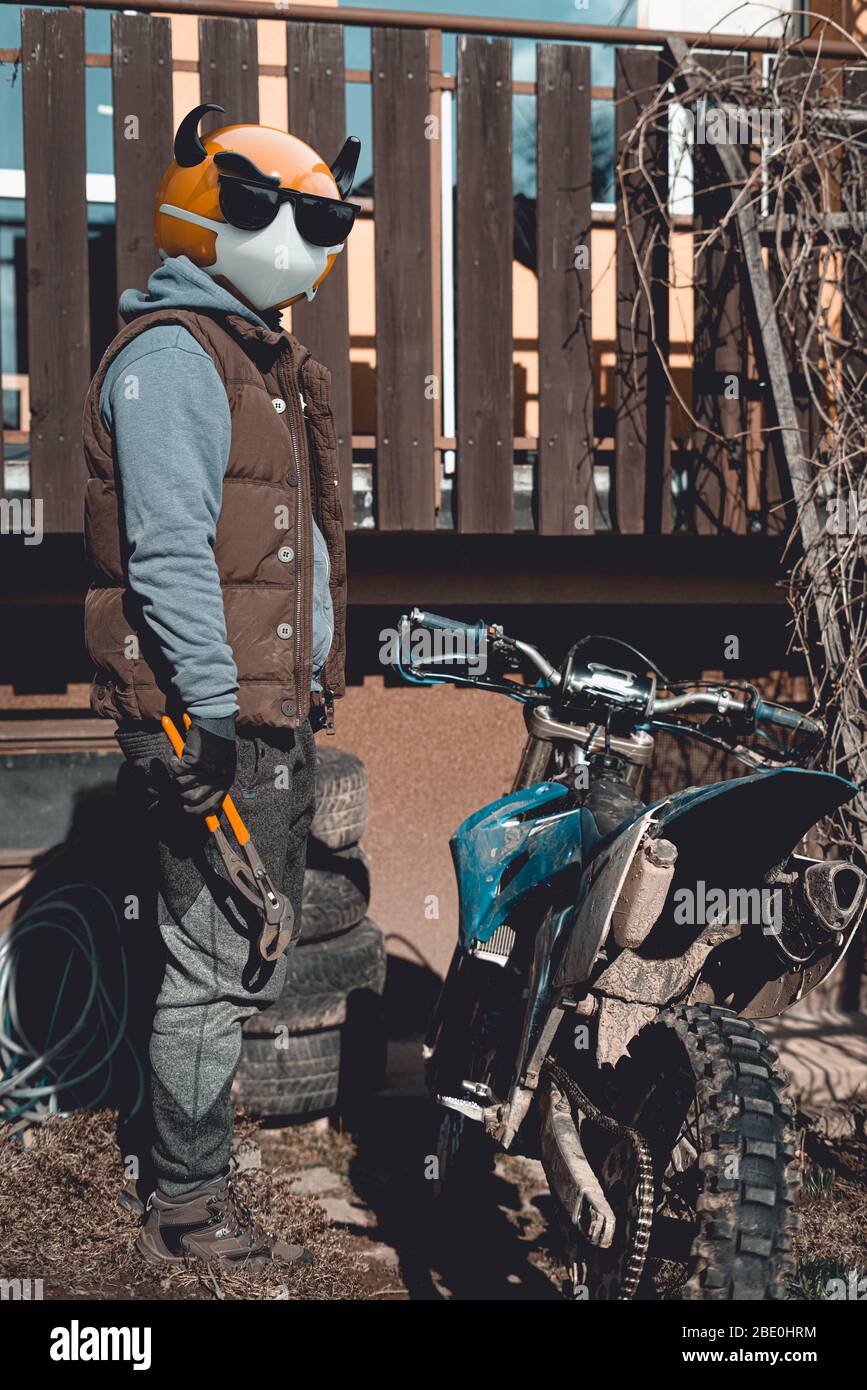 Emoji motocross rider with fancy nerd sunglasses, preparing his ...