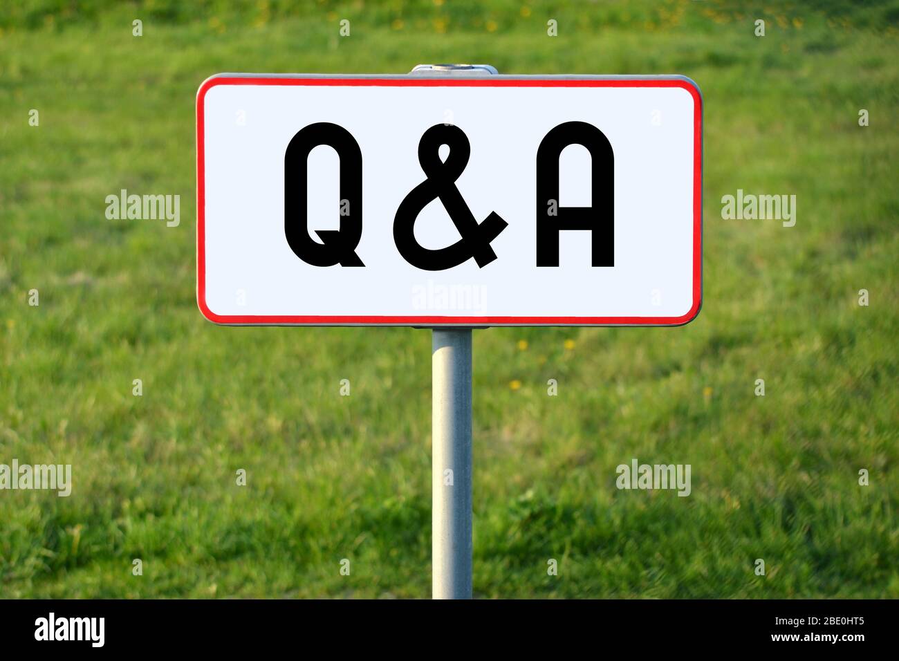 Questions and answers signpost Stock Photo - Alamy