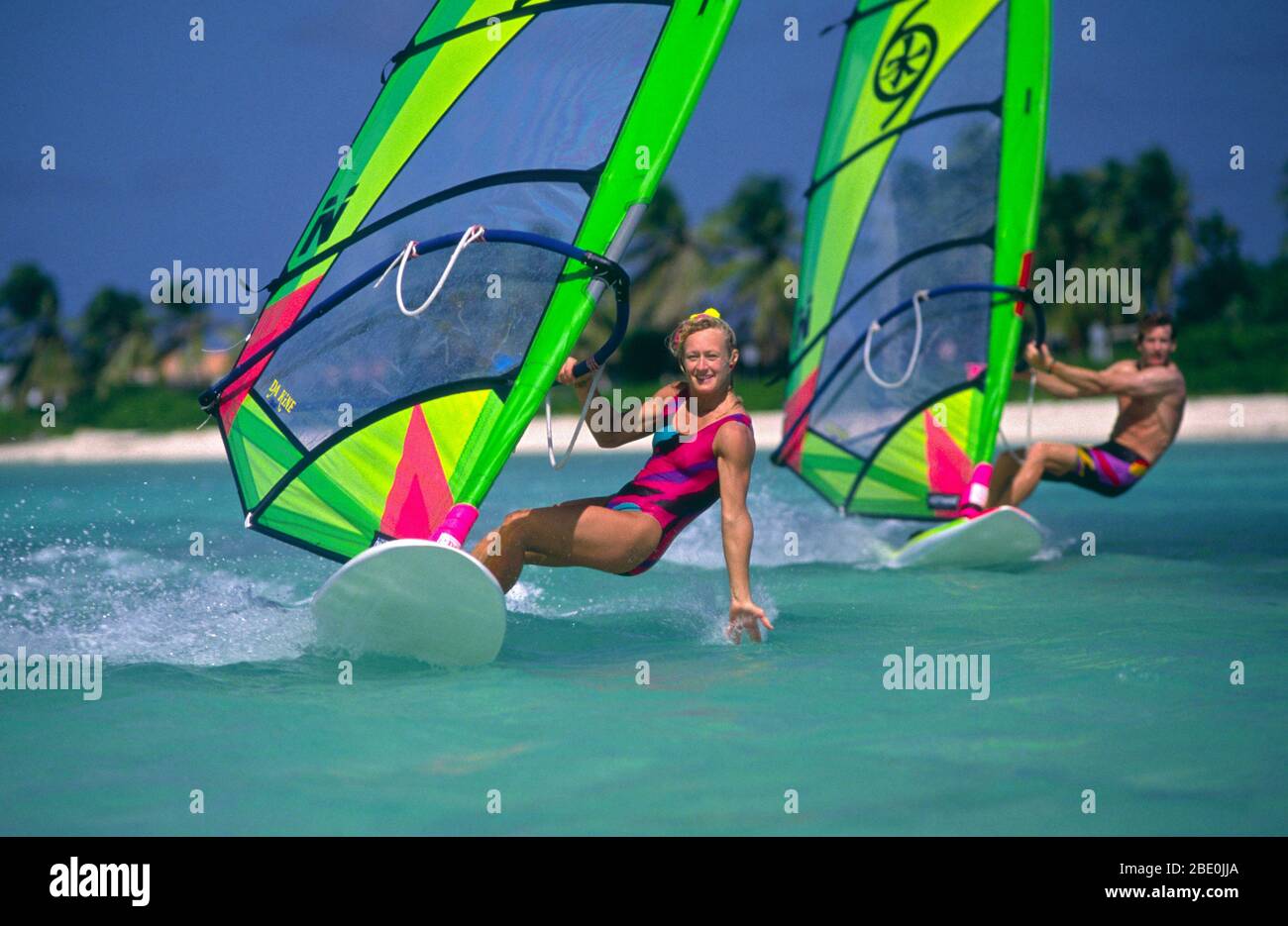 Kay Kucera and Tony Logosz boardsailing in Aruba Stock Photo - Alamy