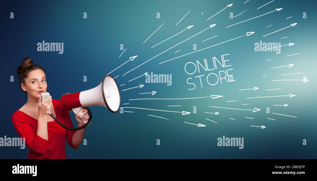 Young girl screaming to megaphone with ONLINE STORE inscription ...