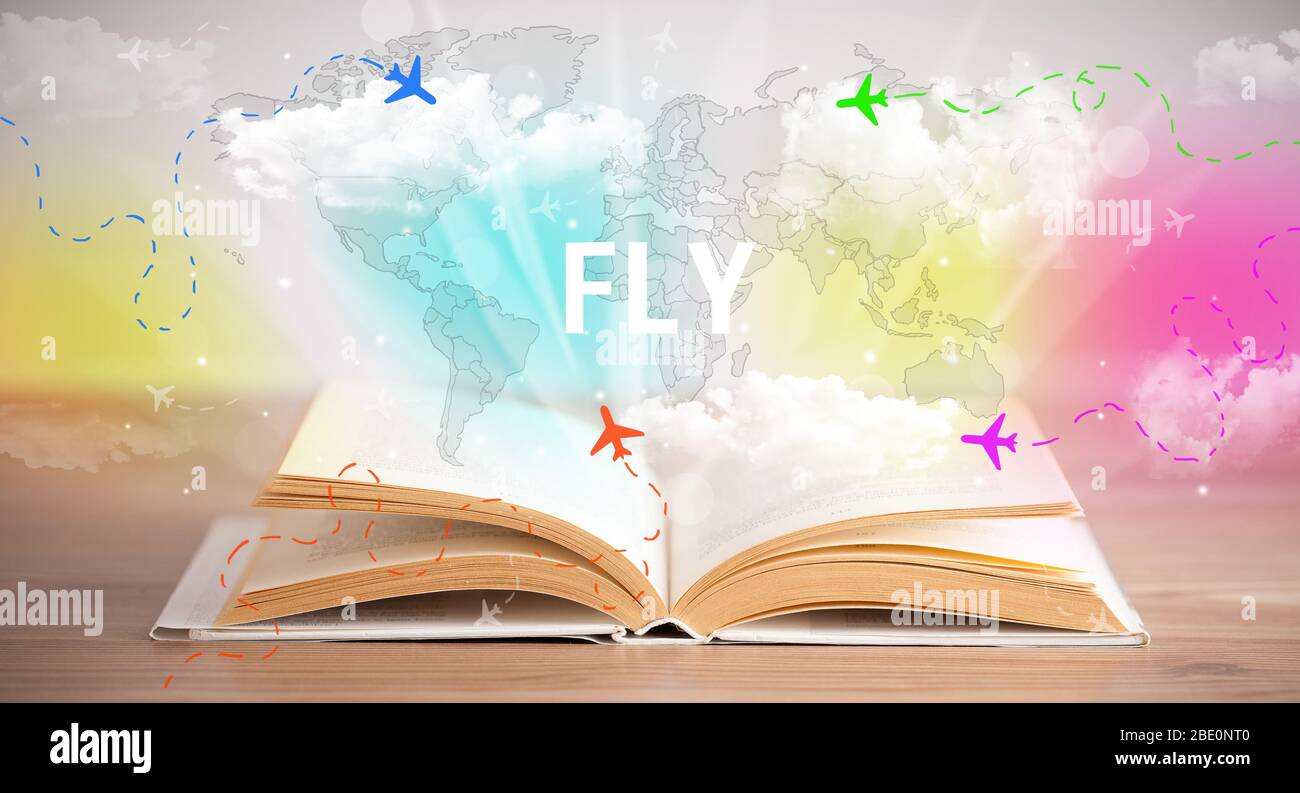 Open book with FLY inscription, vacation concept Stock Photo - Alamy
