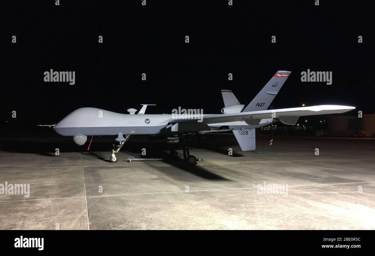 A 119th Wing MQ-9 Reaper aircraft runs an engine test on the flight ...