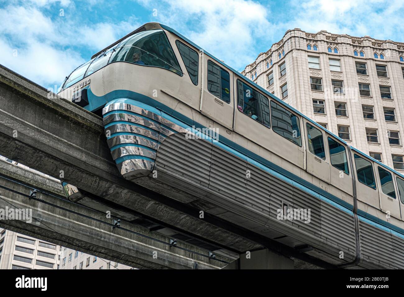 The monorail passing in front an iconic building in Seattle, WA Stock ...