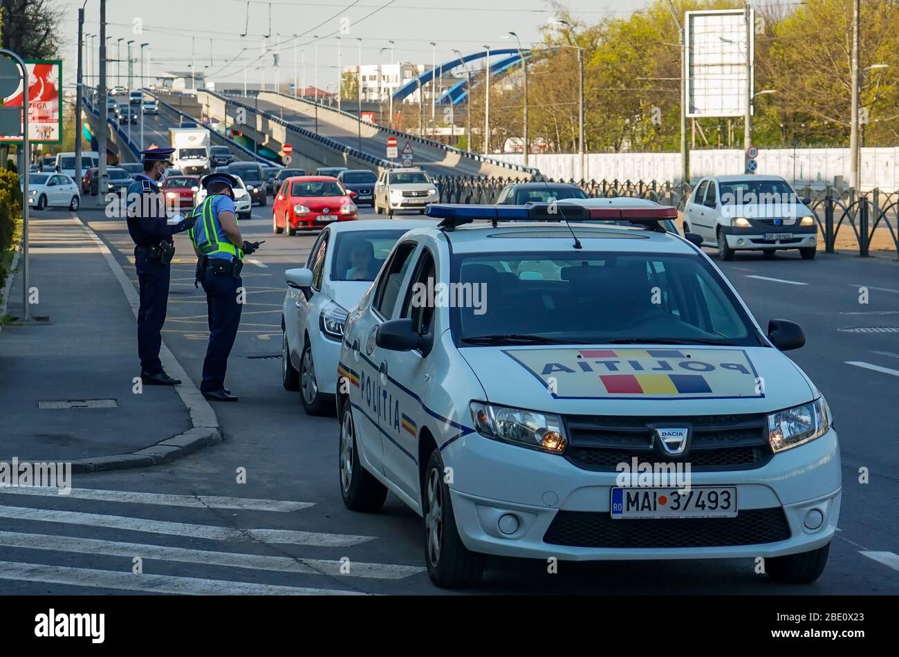 Bucharest, Romania - April 09, 2020: Police officers control drivers in ...