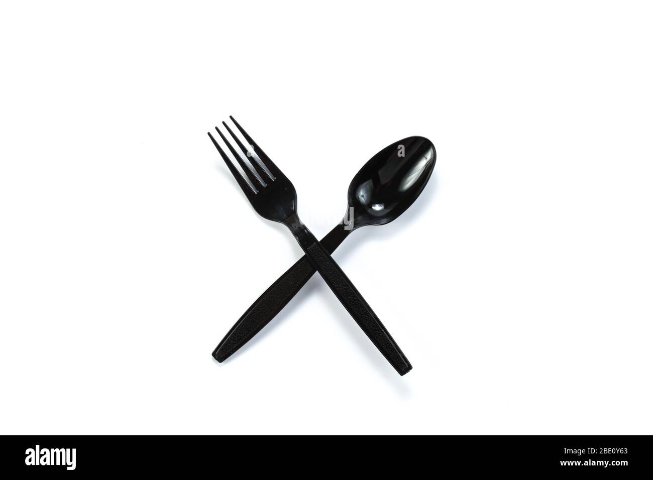 black plastic spoon and fork isolated on white background Stock Photo ...