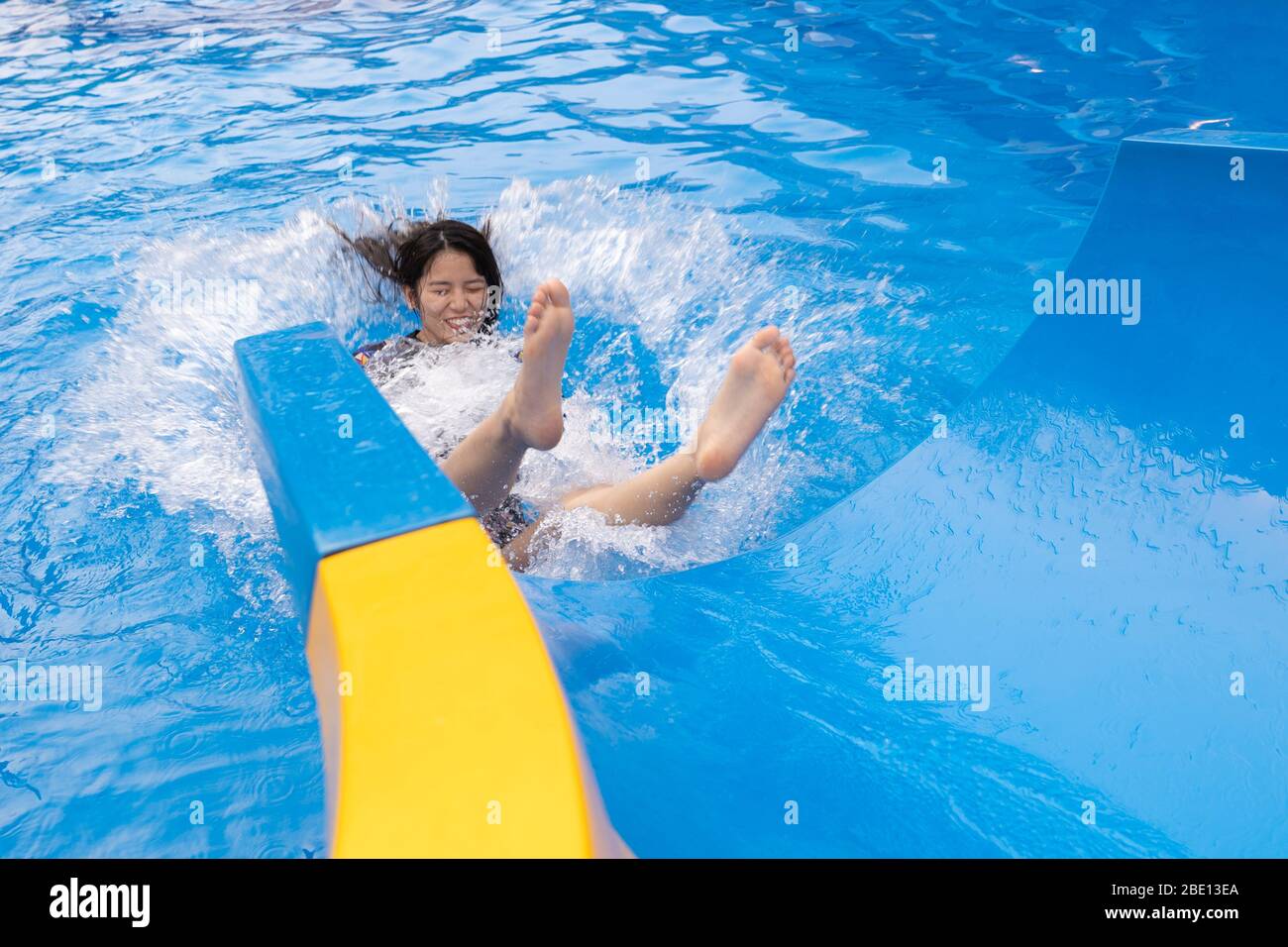 Girl On Water Slide High Resolution Stock Photography and Images - Alamy