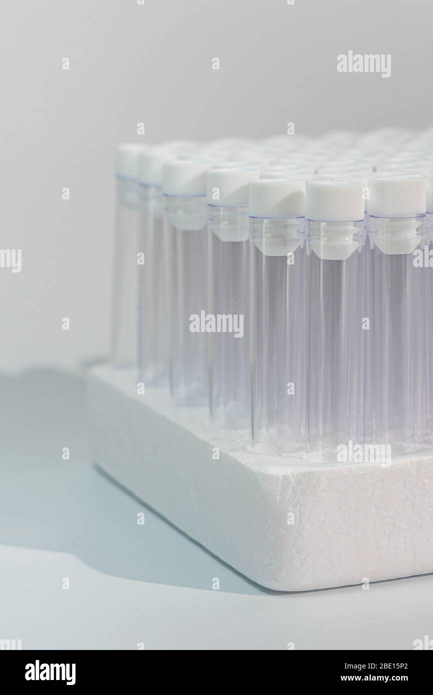 Vertical photo of empty vacuum blood test tubes in laboratory Stock ...