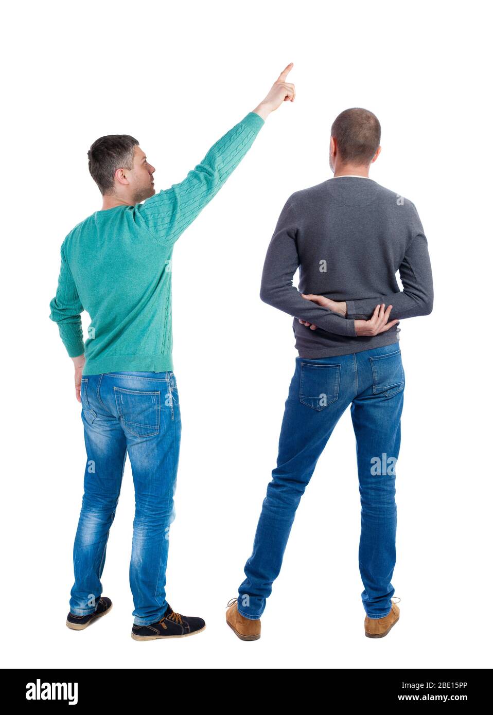 Back view of two man in sweater pointing. Rear view people collection ...