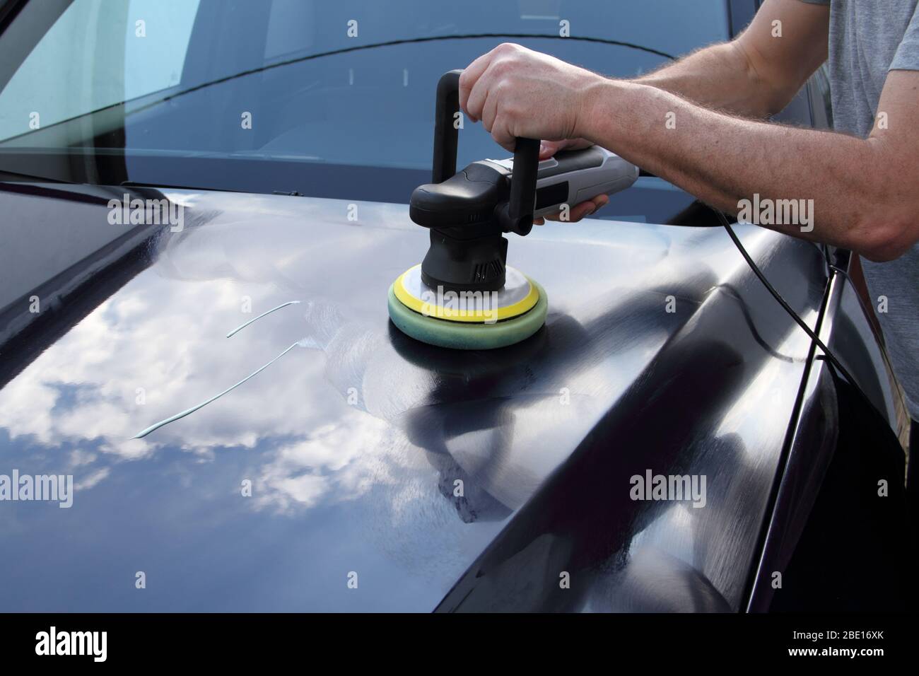 polishing a car with a machine Stock Photo - Alamy