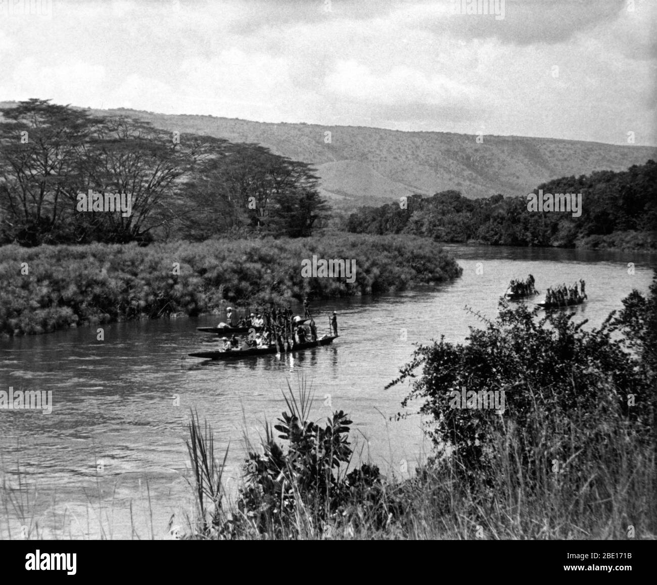 Native Canoes on the Kagera River during location filming for MOGAMBO ...