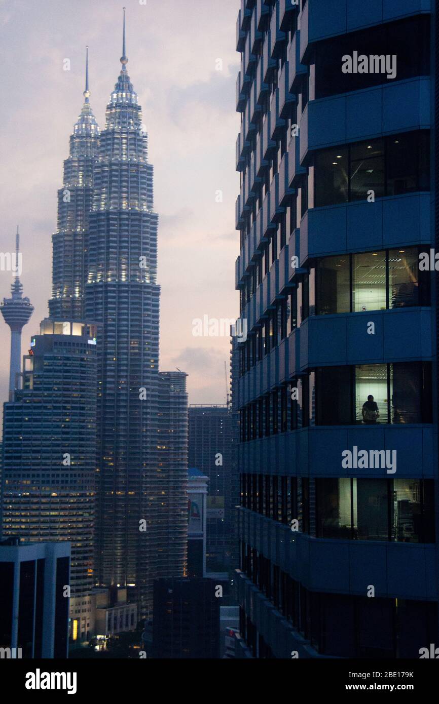 Petronas tower worker hi-res stock photography and images - Alamy