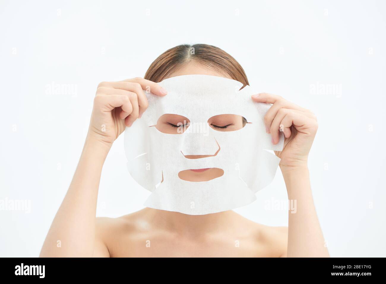 closeup young beauty face and facial mask Stock Photo - Alamy