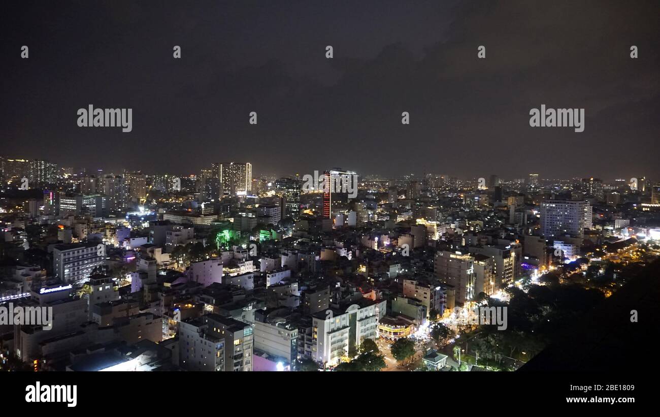 skyline of ho chi minh city at nighttime Stock Photo - Alamy
