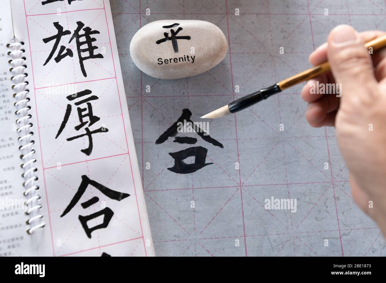 Traveller learn to write Chinese characters, calligraphy is the ...