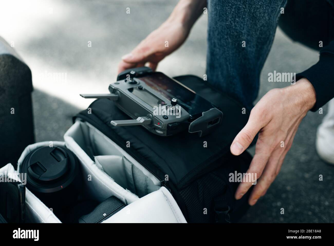 Drone remote control. Remote control in hand man. Man holds remote ...