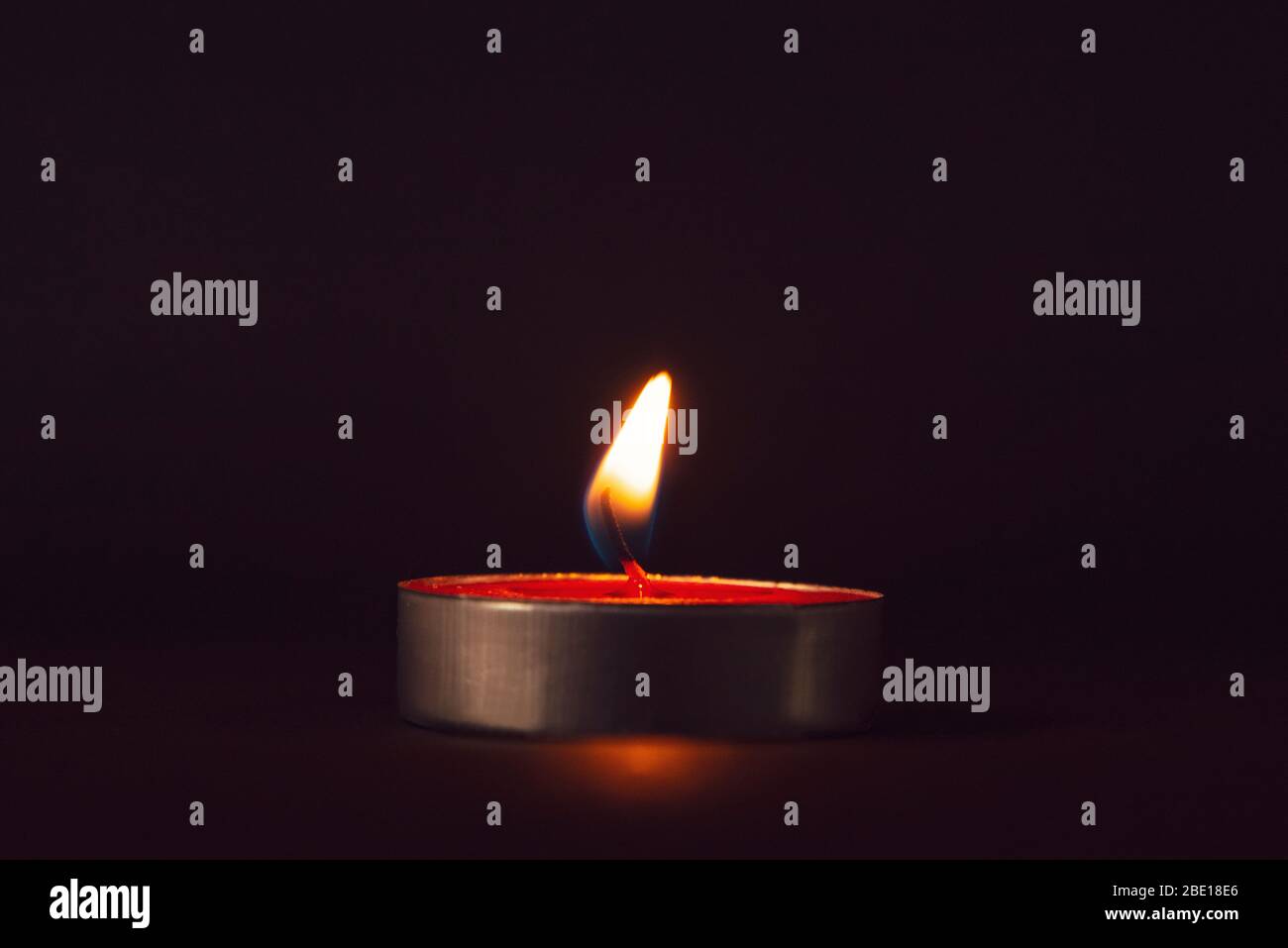 Single candle burning hi-res stock photography and images - Alamy